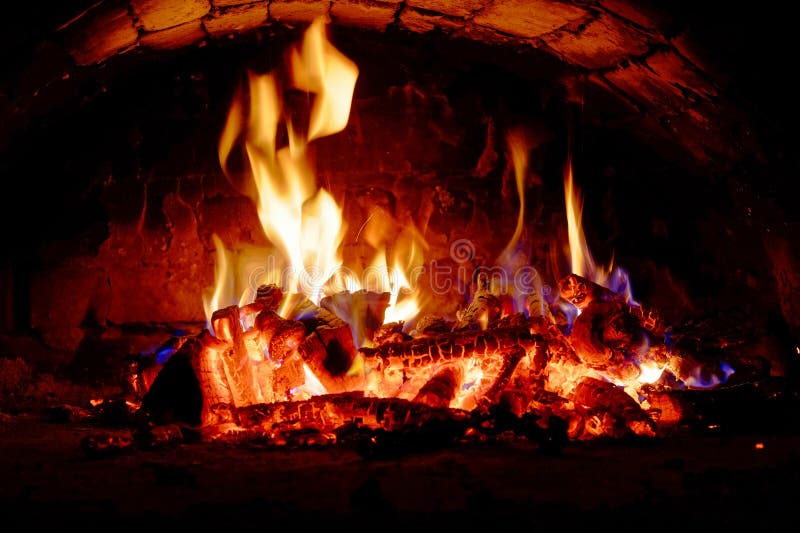 Burning Logs are Surrounded by Vibrant, Moving Flames of Fire Stock ...