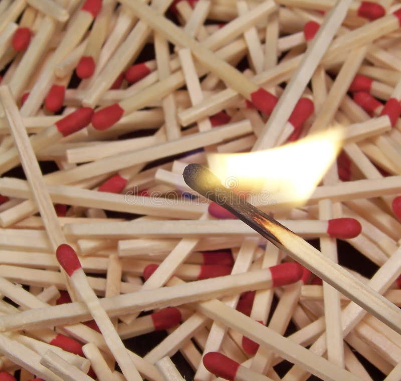 Lit Match With Unlit Matches - Free Photo from StockFreeImages
