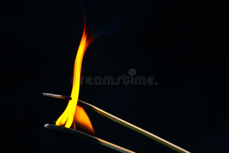 Burning Match on a Black Background. Heat and Light from Fire Flame ...