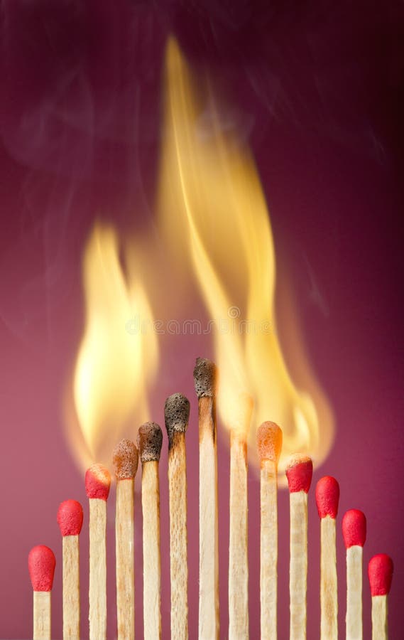 Burning Match Setting Fire To Its Neighbors Stock Photo - Image of ...