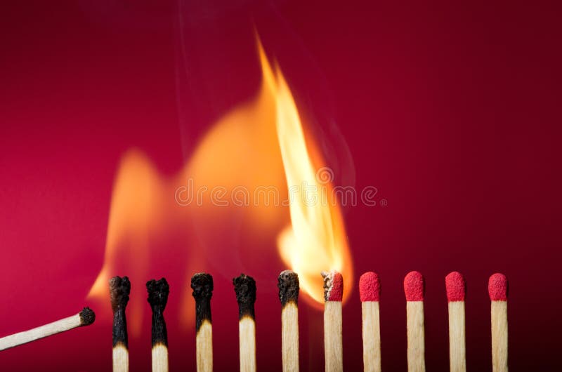 Burning Match Setting Fire To Its Neighbors Stock Photo - Image of ...