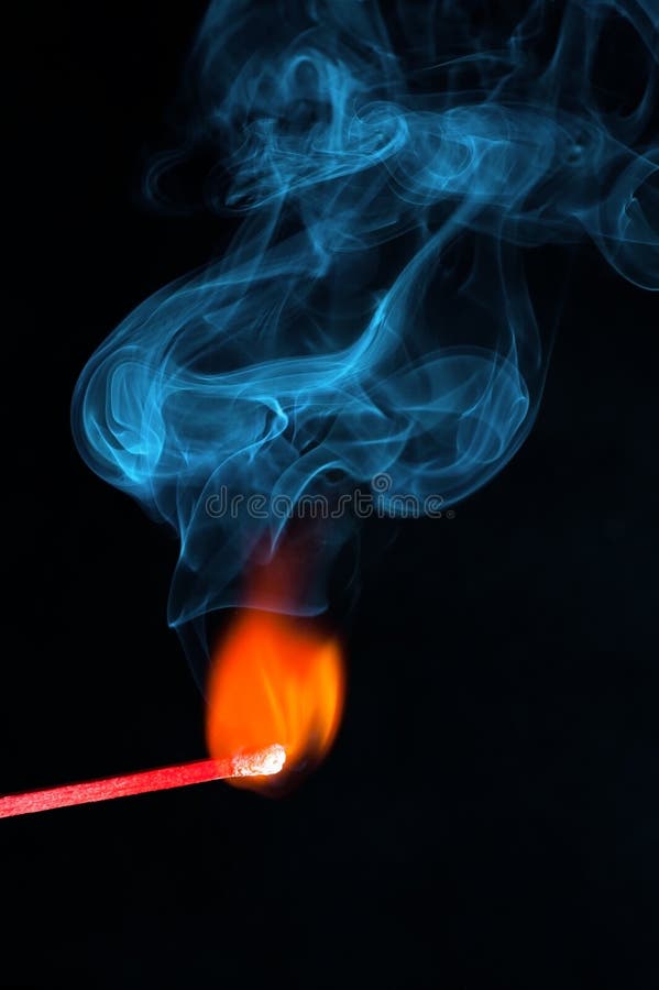 A burning match and smoke stock image. Image of darkness - 25058393