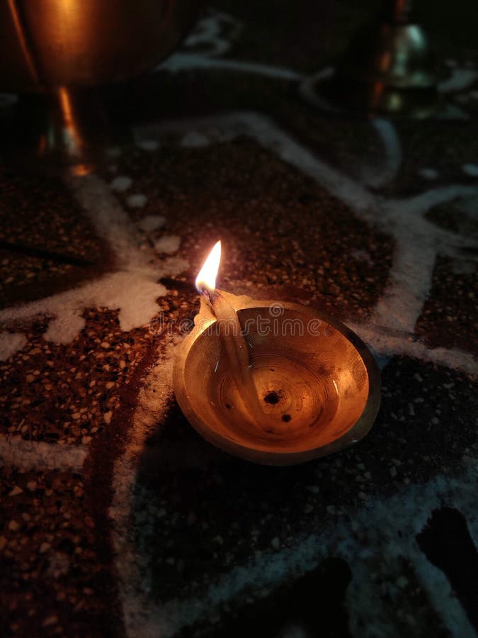 Burning Oil Candle with a Yellow Flame Radiating Light, Providing a ...