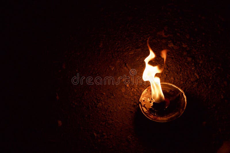 Burning oil lamp flame stock image. Image of ablaze - 101702221