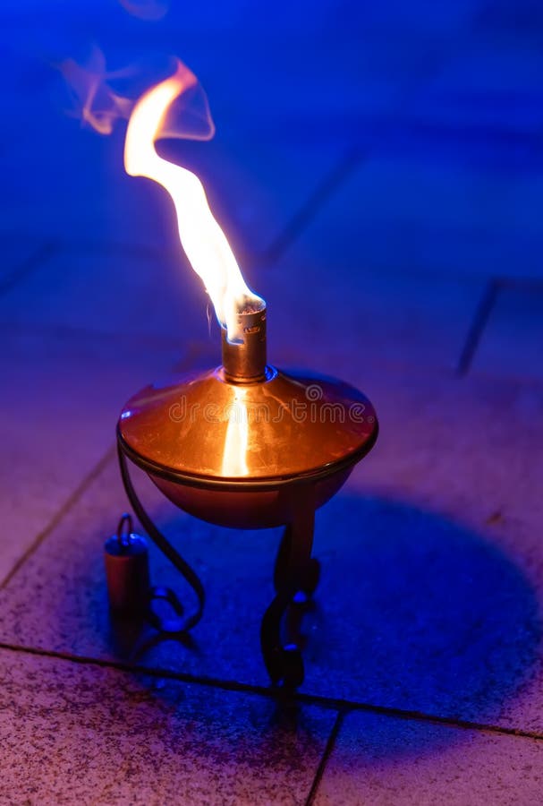 Burning Oil Lamp on Floor at Evening Stock Photo - Image of evening ...