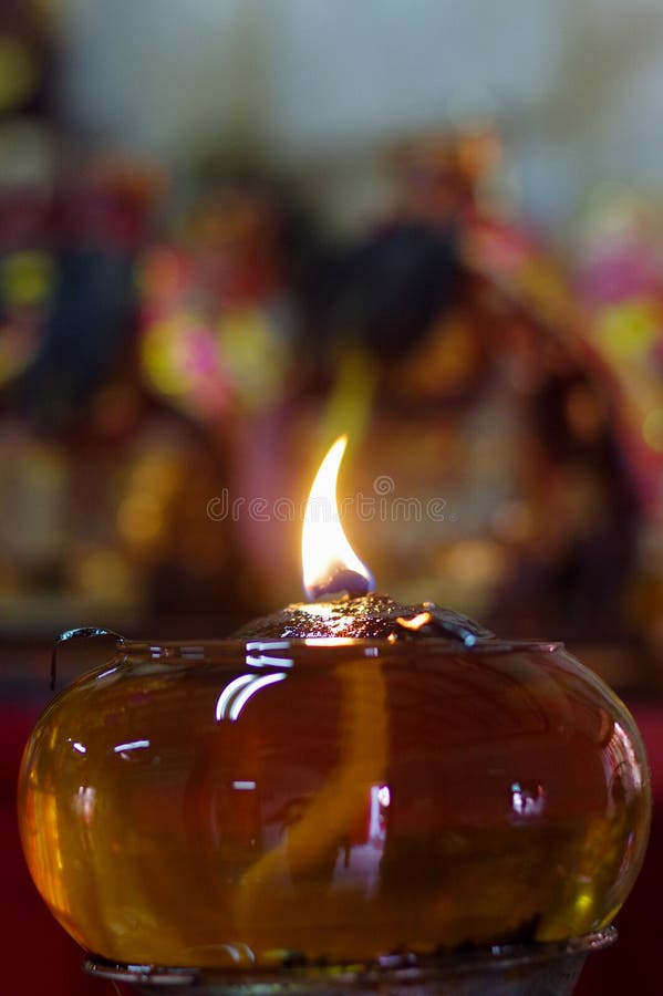 Burning Oil Lamps at Religious Temple. Thailand Stock Image - Image of ...