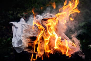 Burning Old Clothes. Burning Clothes after an Outbreak of Infectious ...