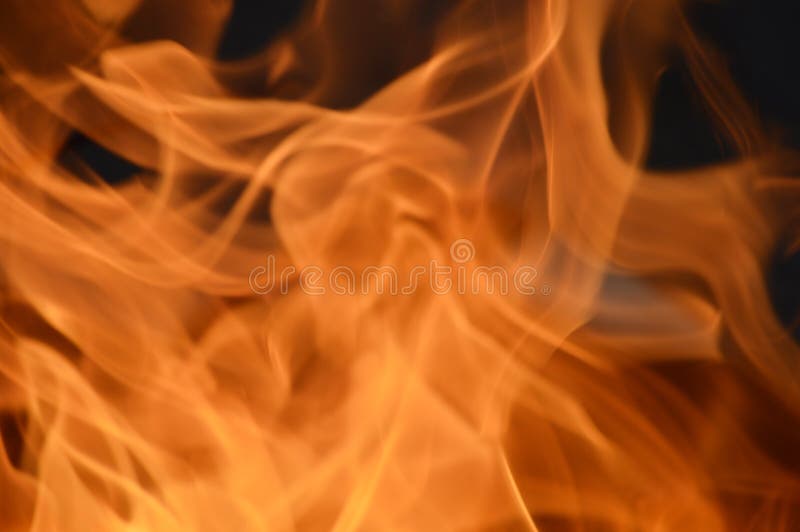 Burning Orange Fire Flames on a Black Background. Flame Texture ...
