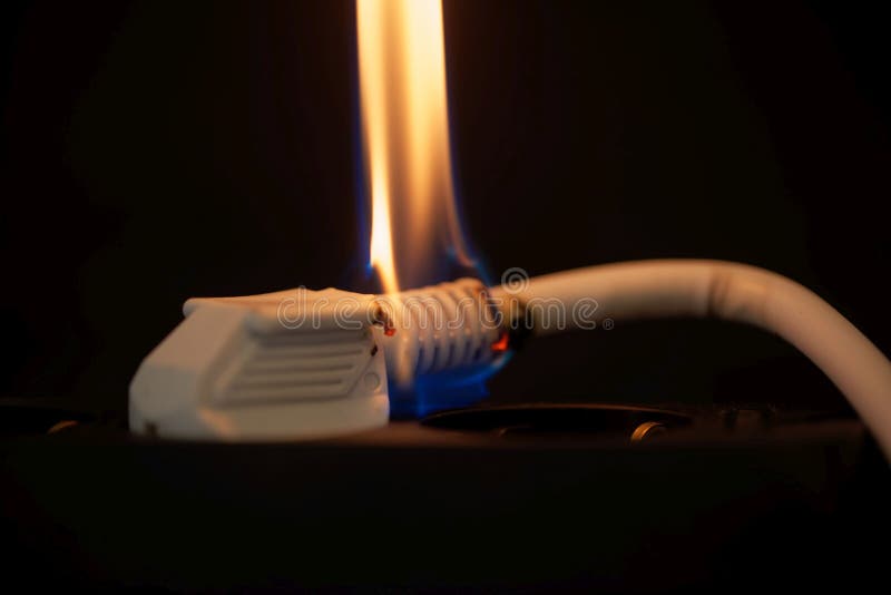 Burning Plug Socket with a Flame Stock Photo - Image of bankruptcy ...