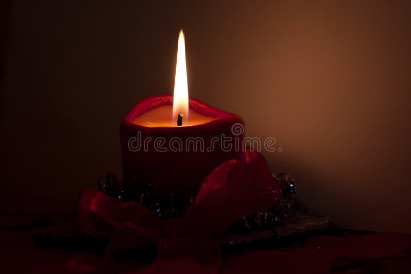 Burning red candle stock image. Image of fire, tranquility - 22651297