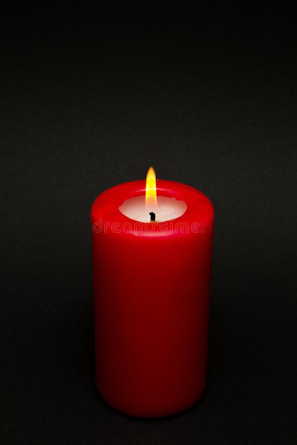 Burning Red Candle on a Black Background Stock Photo - Image of night ...
