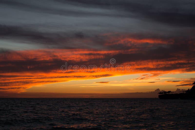 Burning red cloudy sunset stock image. Image of rest - 61512725