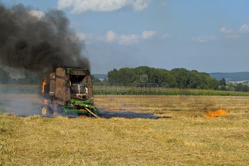 Burning round baler stock image. Image of agriculture - 26324625