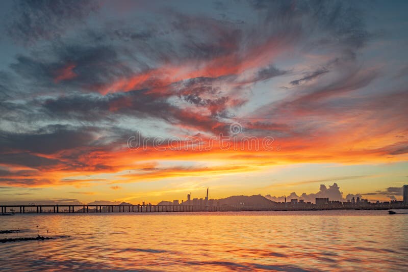 Burning sky in summer stock photo. Image of coast, evening - 261191880
