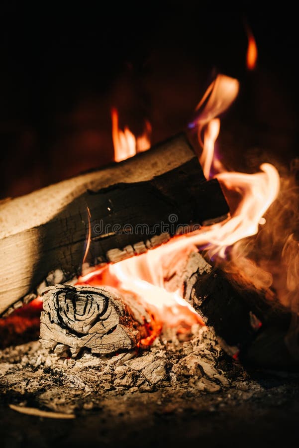 Burning Smoldering Fire in a Stone Fireplace Stock Photo - Image of ...