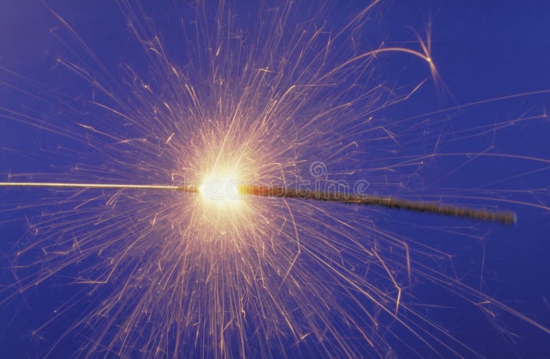Burning Sparklers in the Dark Stock Image - Image of closeup, orange ...