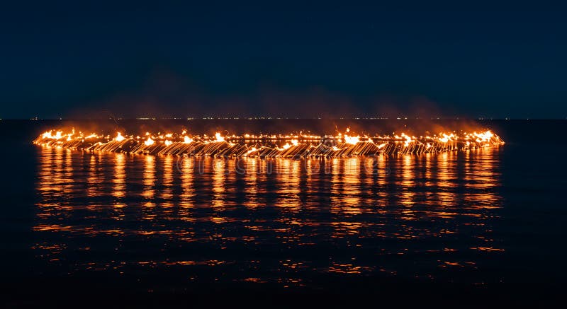 Burning Structure on Water at Night with Reflection Stock Illustration ...