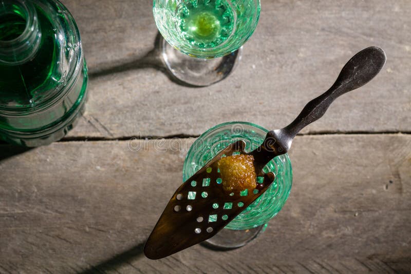 Burning Sugar on Spoon in Glass of Absinthe Stock Image - Image of ...