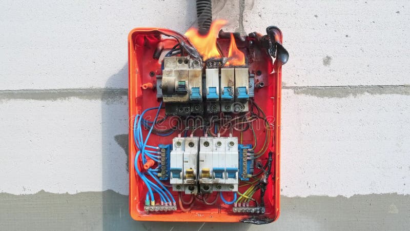 Burning Switchboard from Overload or Short Circuit on the Wall Stock ...