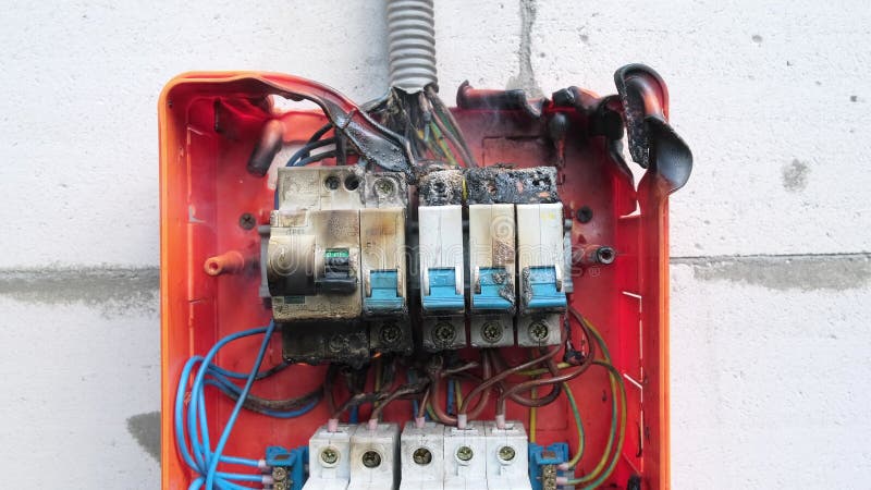 Burning Switchboard from Overload or Short Circuit on the Wall Stock ...