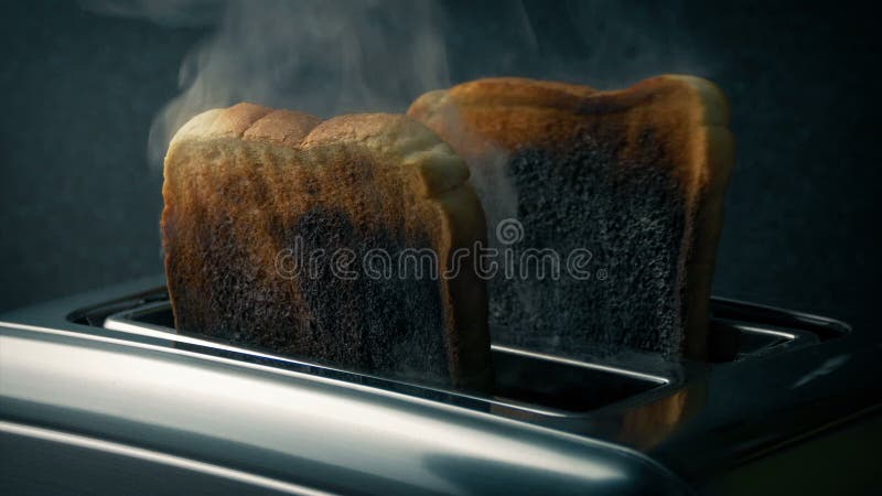 Burning toast in toaster stock video. Video of mistake - 133822361