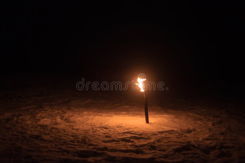 Burning Torch in the Cold Winter Stock Image - Image of arson, glow ...
