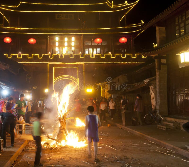 Burning Torch in Front of Chinese Gate Editorial Photo - Image of ...