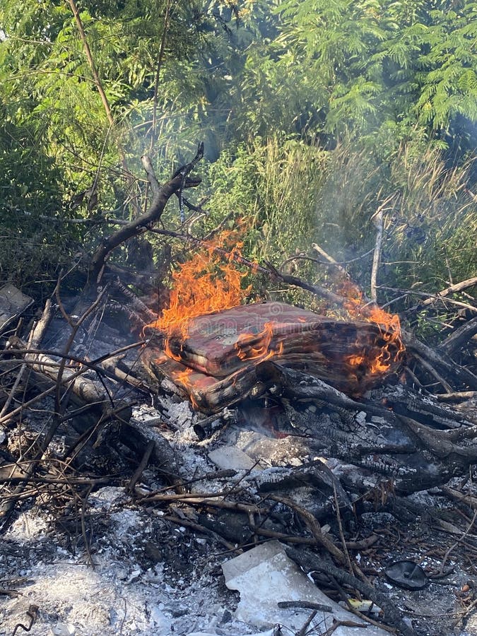 Burning trash stock photo. Image of mattress, burning - 327217792