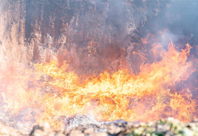 Burning waste in fire pit stock photo. Image of heat - 342876476