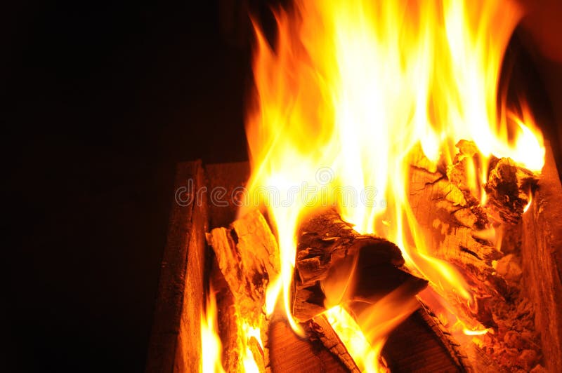 Burning wood stock photo. Image of yellow, heat, space - 13505802