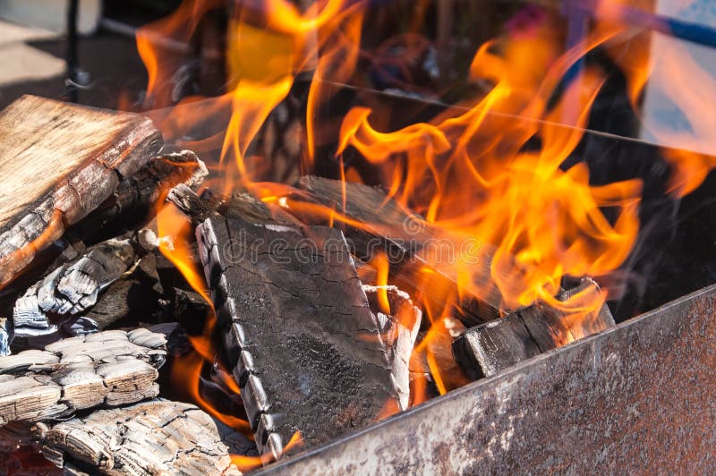 Burning wood brazier stock photo. Image of leisure, glow - 68394782