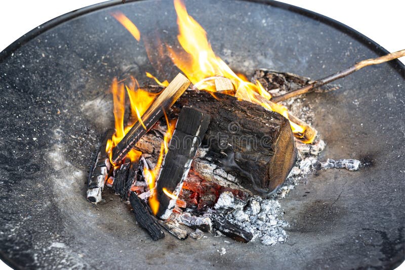 A Burning Wood Fire on a Metal Grate, Isolated on a White Background ...