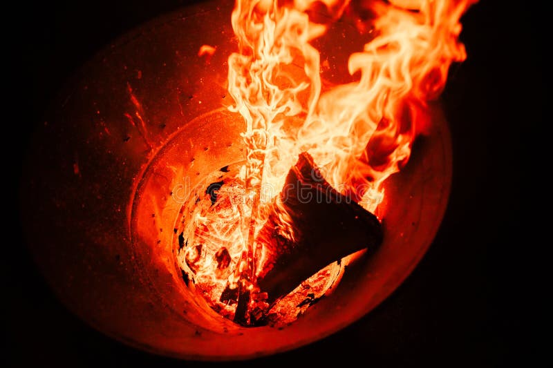 Burning Wood Inside a Burning Barrel Stock Photo - Image of dark, burn ...