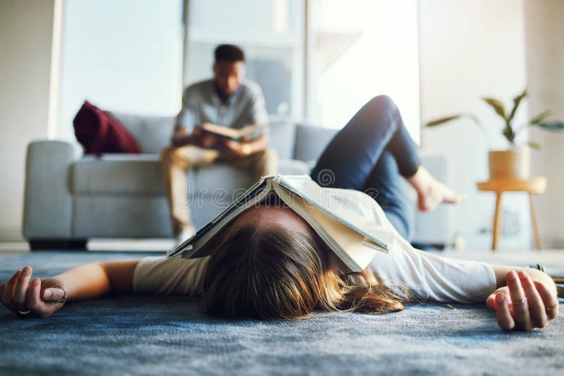 Burnout, Tired and Student with Book on Face Laying on Floor after ...