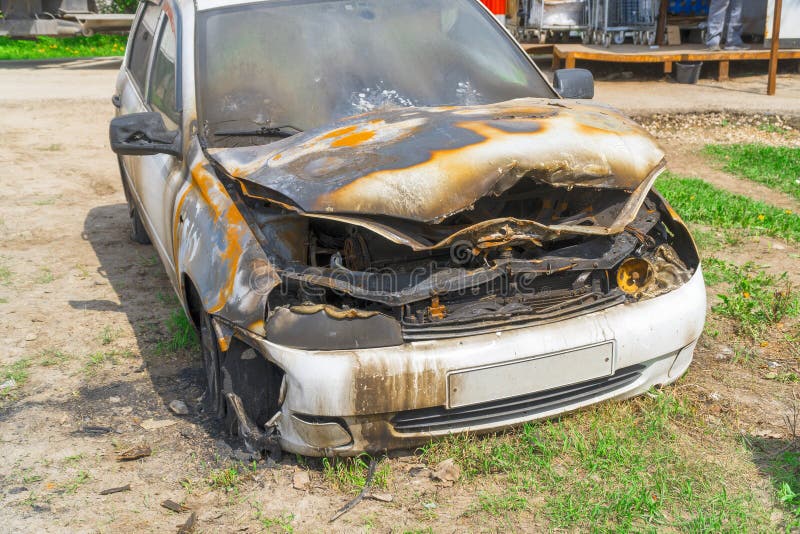 Burnt car on the street stock photo. Image of rubbish - 155530526