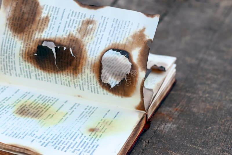 Burnt, Charred Book on a Wooden Table Stock Photo - Image of heat ...