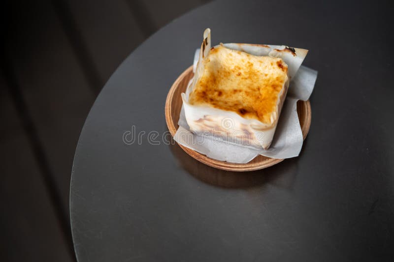 Burnt Cheesecake Served on Wooden Plate Stock Image - Image of cream ...