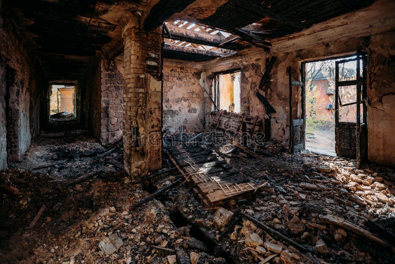 Burnt House Interior. Burned Furniture, Charred Walls And Ceiling In ...