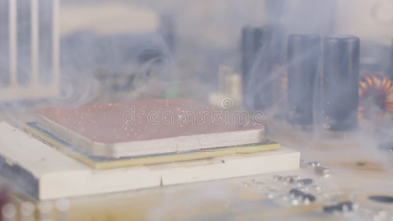 Burnt CPU on the Motherboard. Burnt Smoking Microprocessor Stock Video ...