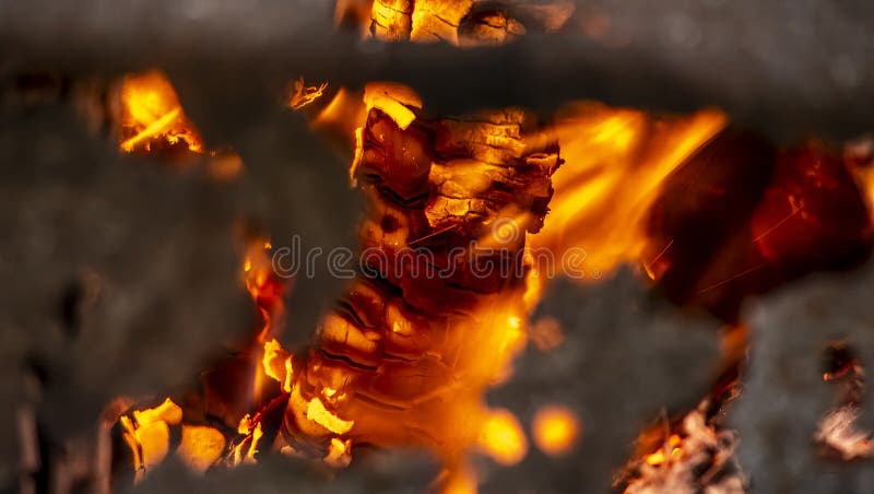 Burnt Iron, Behind Which You Can See Fire. Low Light Stock Photo ...