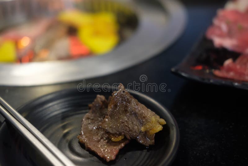 Burnt Meat on the Black Dish Stock Photo - Image of lunch, burnt: 245928558