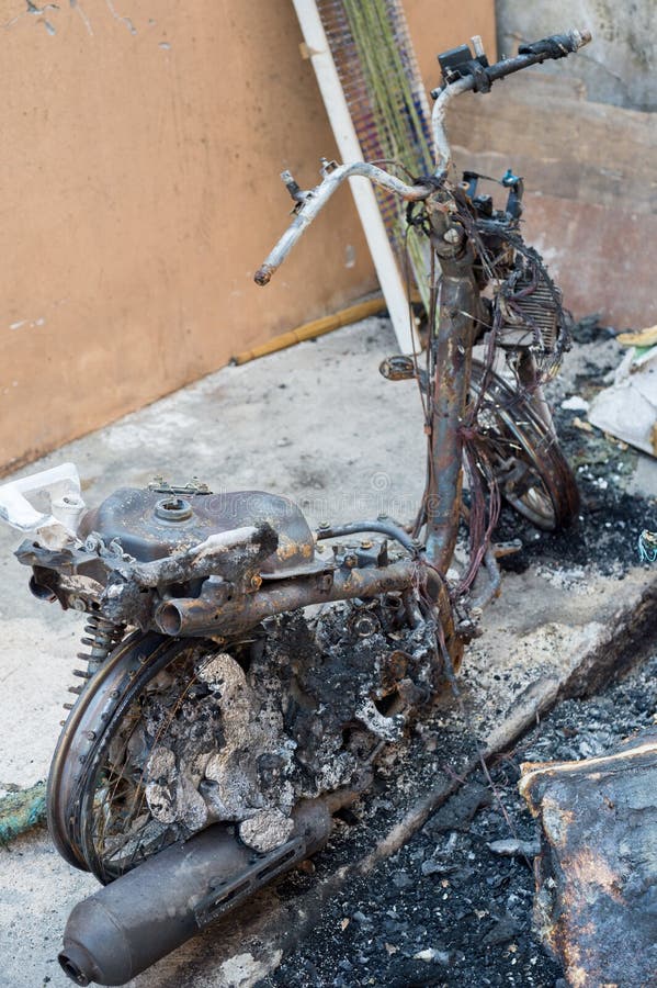 Burnt Motorcycle stock photo. Image of vandalism, wheel - 69035162