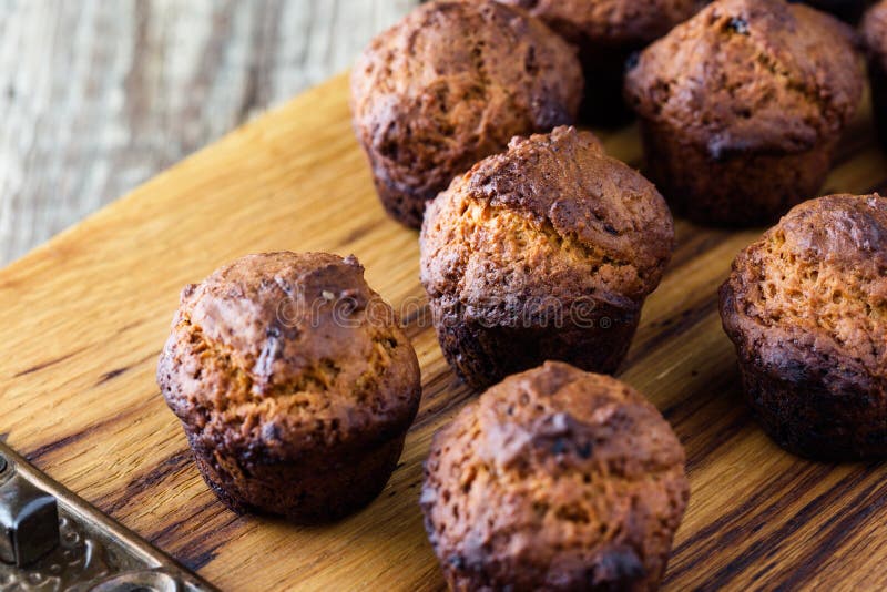 Burnt Muffins on Rustic Wooden Table Stock Photo - Image of eating ...