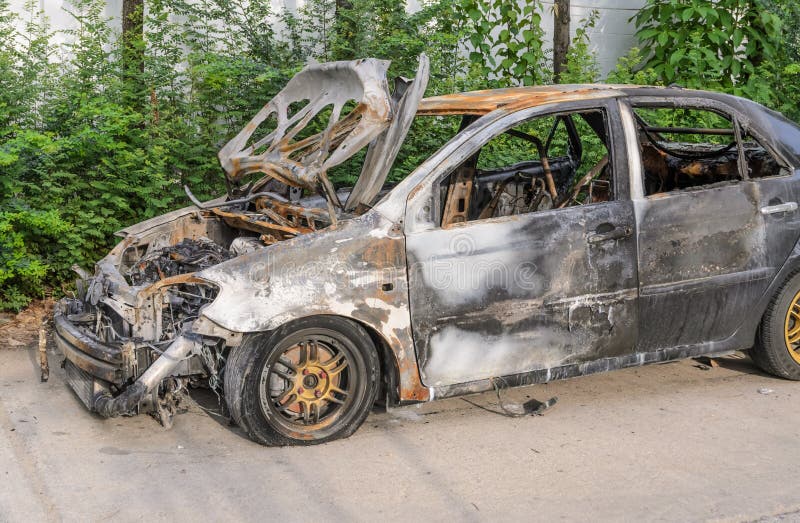Burnt out car wreck stock image. Image of steel, garage - 44355359