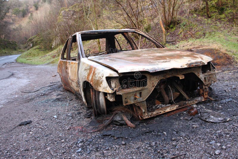 Burnt Out Car Wreck on Road Stock Image - Image of burned, road: 13770823