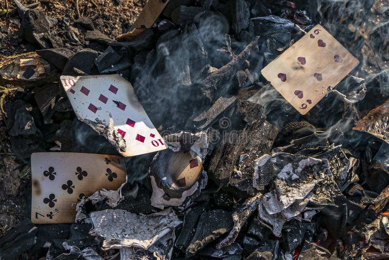 Burnt Playing Cards in Smoke Ashes after Fire Flame. Struggle with ...