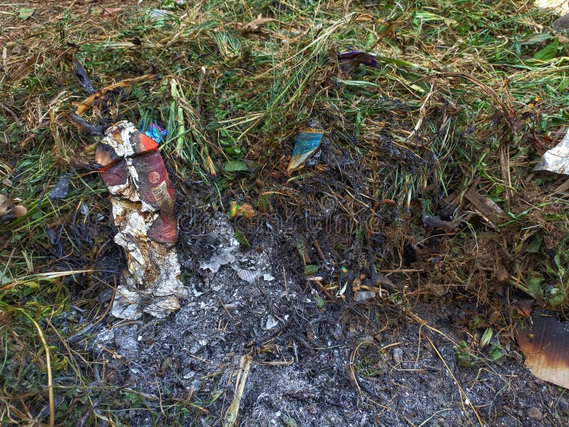 The Burnt Remains of Dead Garbage and Grass. Stock Image - Image of ...