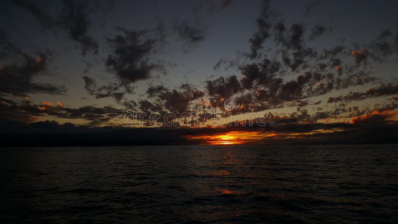 Burnt sun stock image. Image of orange, sunset, reflected - 86343577