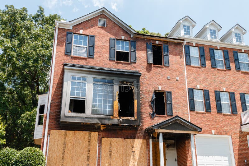 A Burnt Townhouse that Was on Fire. Stock Photo - Image of candle ...
