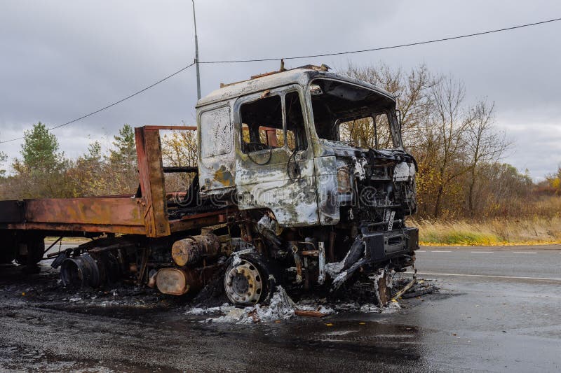 Burnt Truck on the Road. Fire or Attack Aftermath Stock Image - Image ...